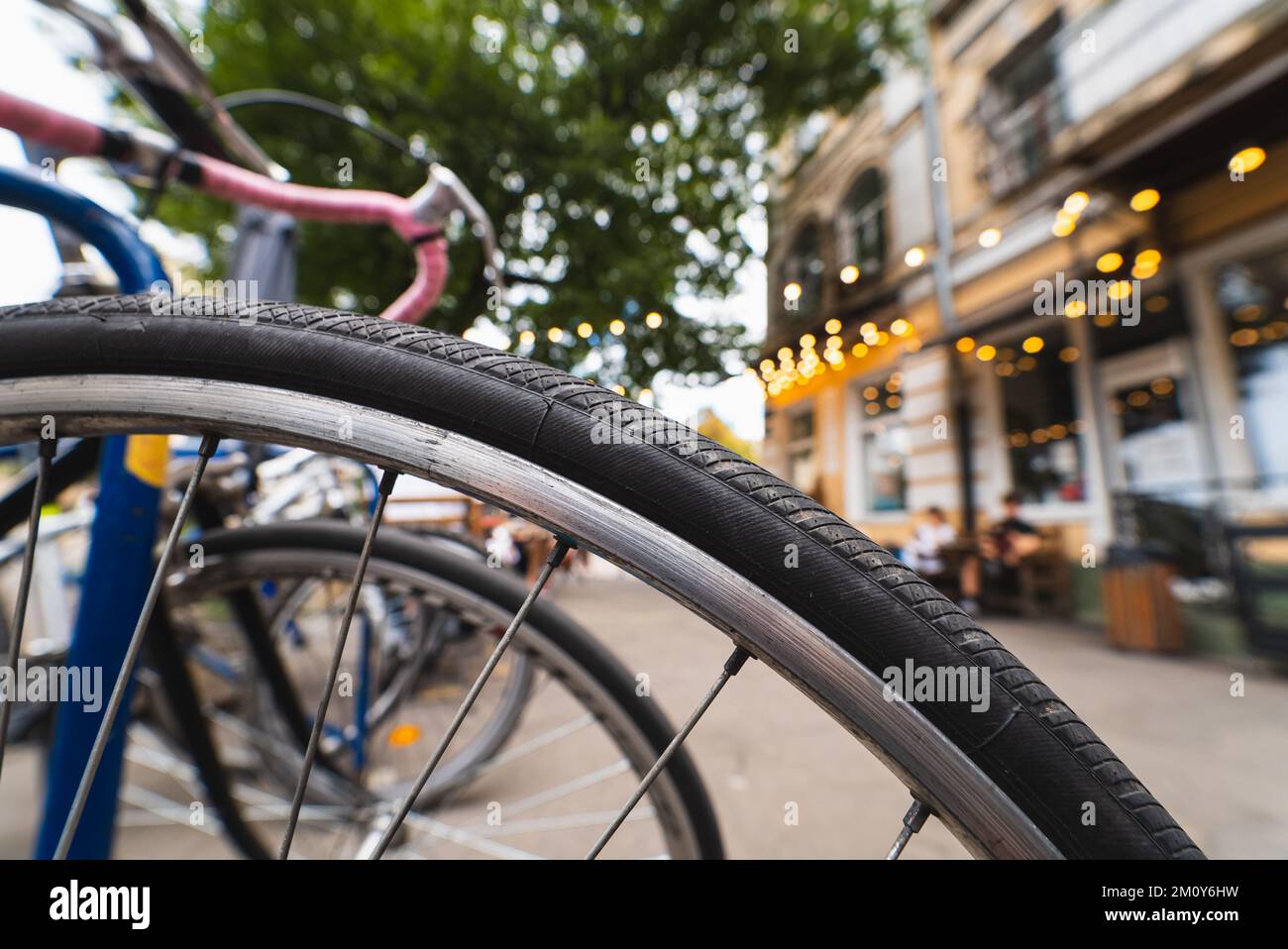 Bike Wheels close up on the street Stock Photo - Alamy