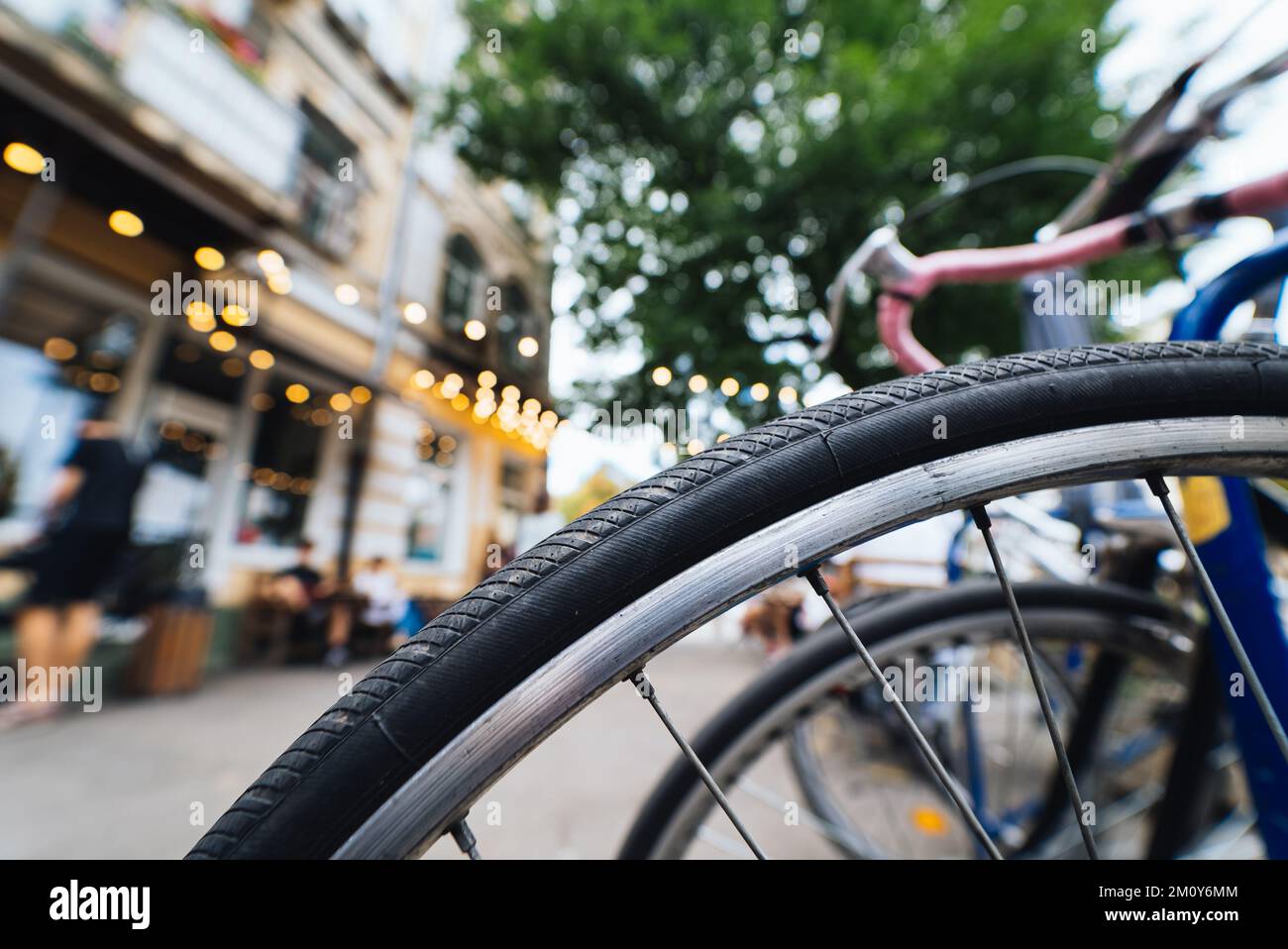 Bike Wheels close up on the street Stock Photo - Alamy