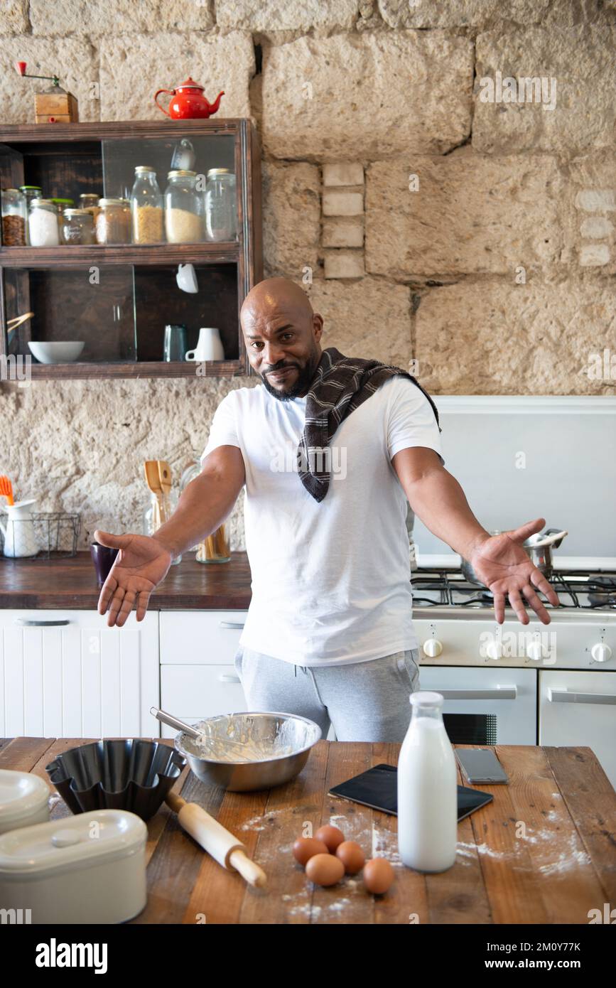 african man in the kitchen of his house Stock Photo - Alamy