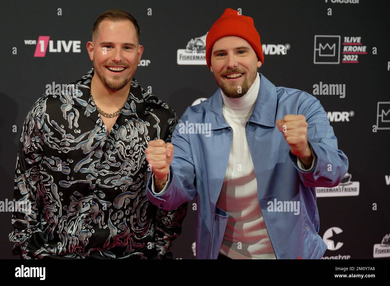 Bochum, Germany. 08th Dec, 2022. Comedians Dennis and Benni Wolter walk ...