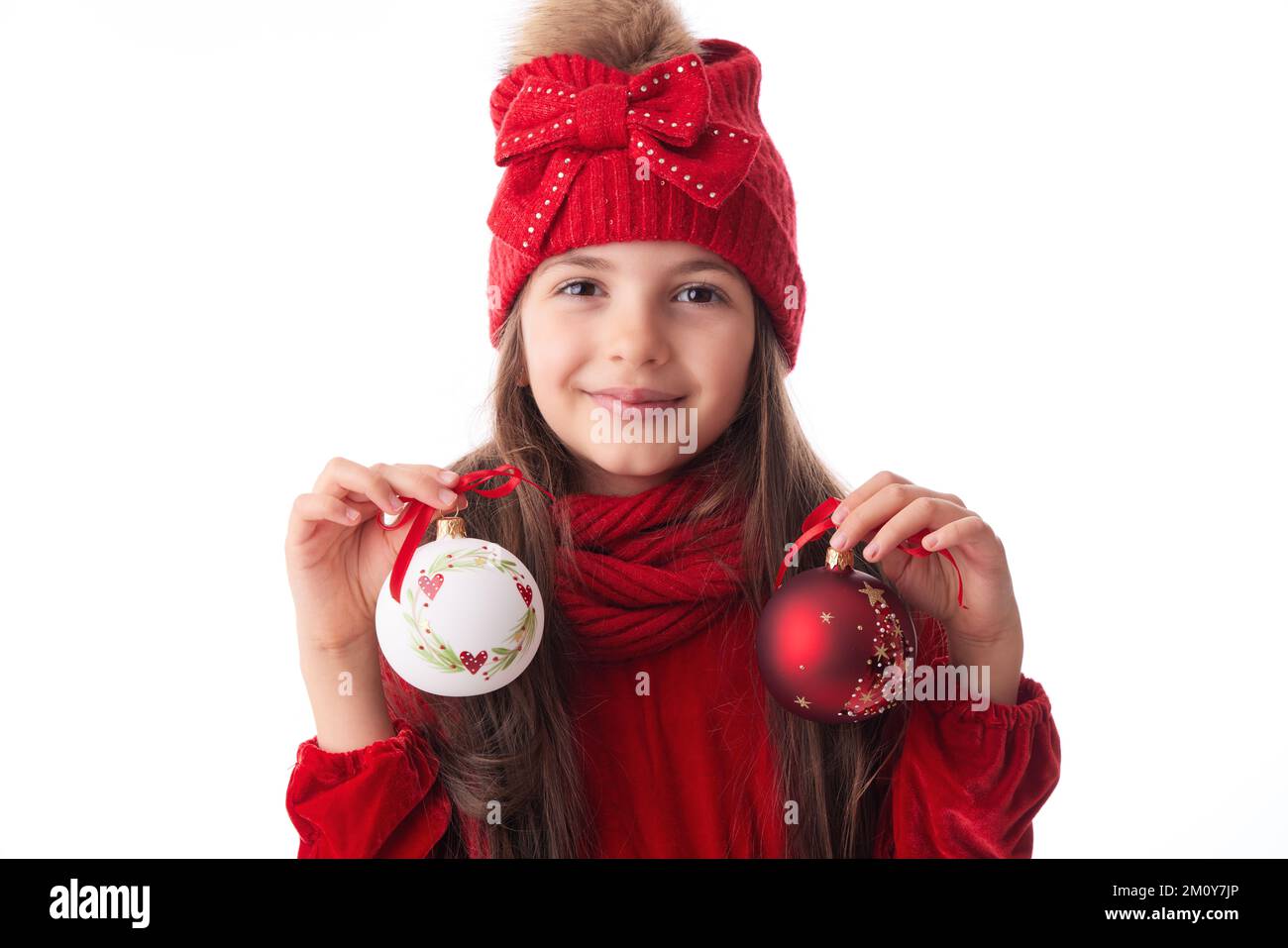 Smiling woman with Christmas tree shining balls, girl posing in red ...