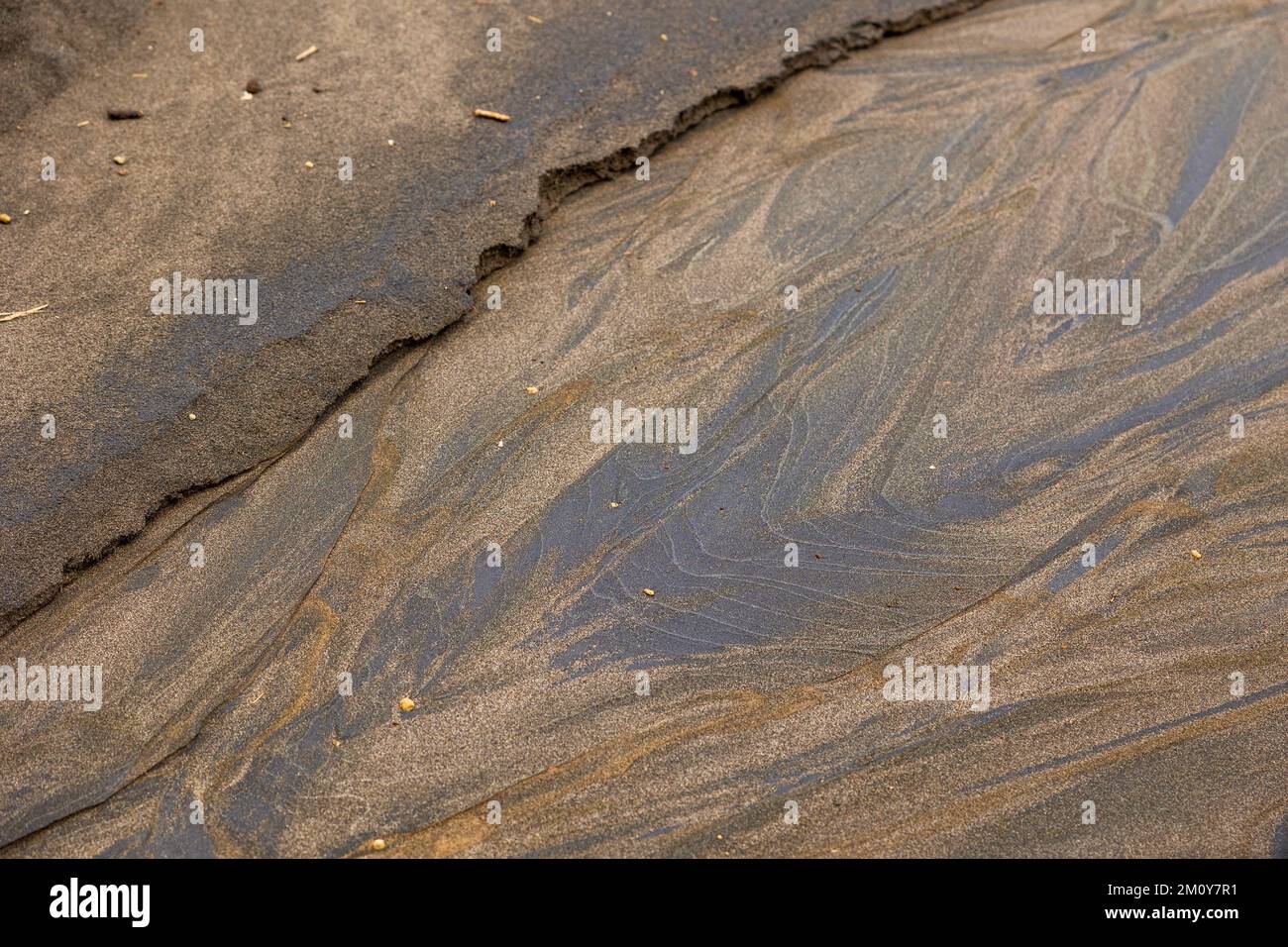 Sand texture, black, atlantic ocean, Azores islands Stock Photo - Alamy