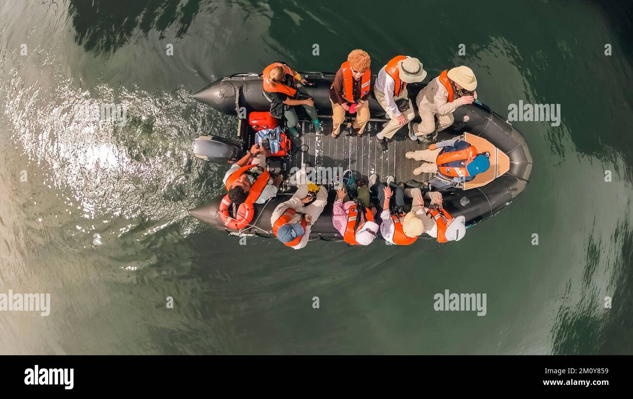 Travelers exploring Barro Colorado Island onboard of a zodiak. Located ...