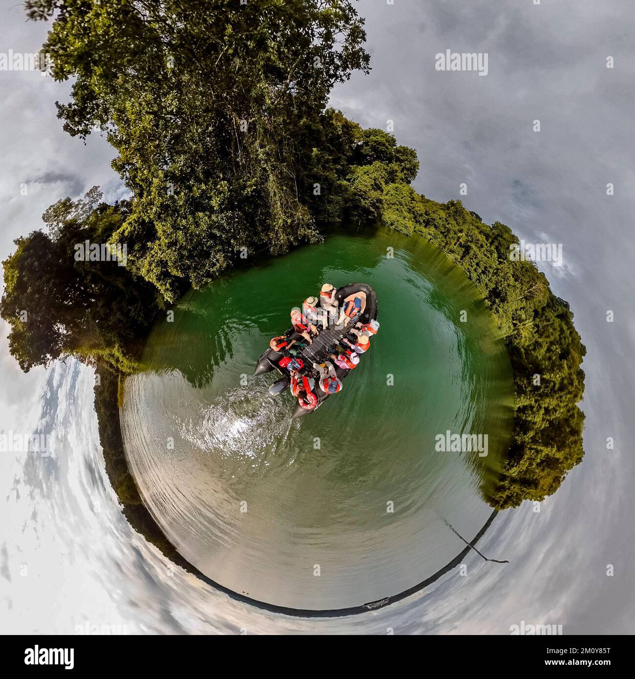 Travelers exploring Barro Colorado Island onboard of a zodiak. Located ...