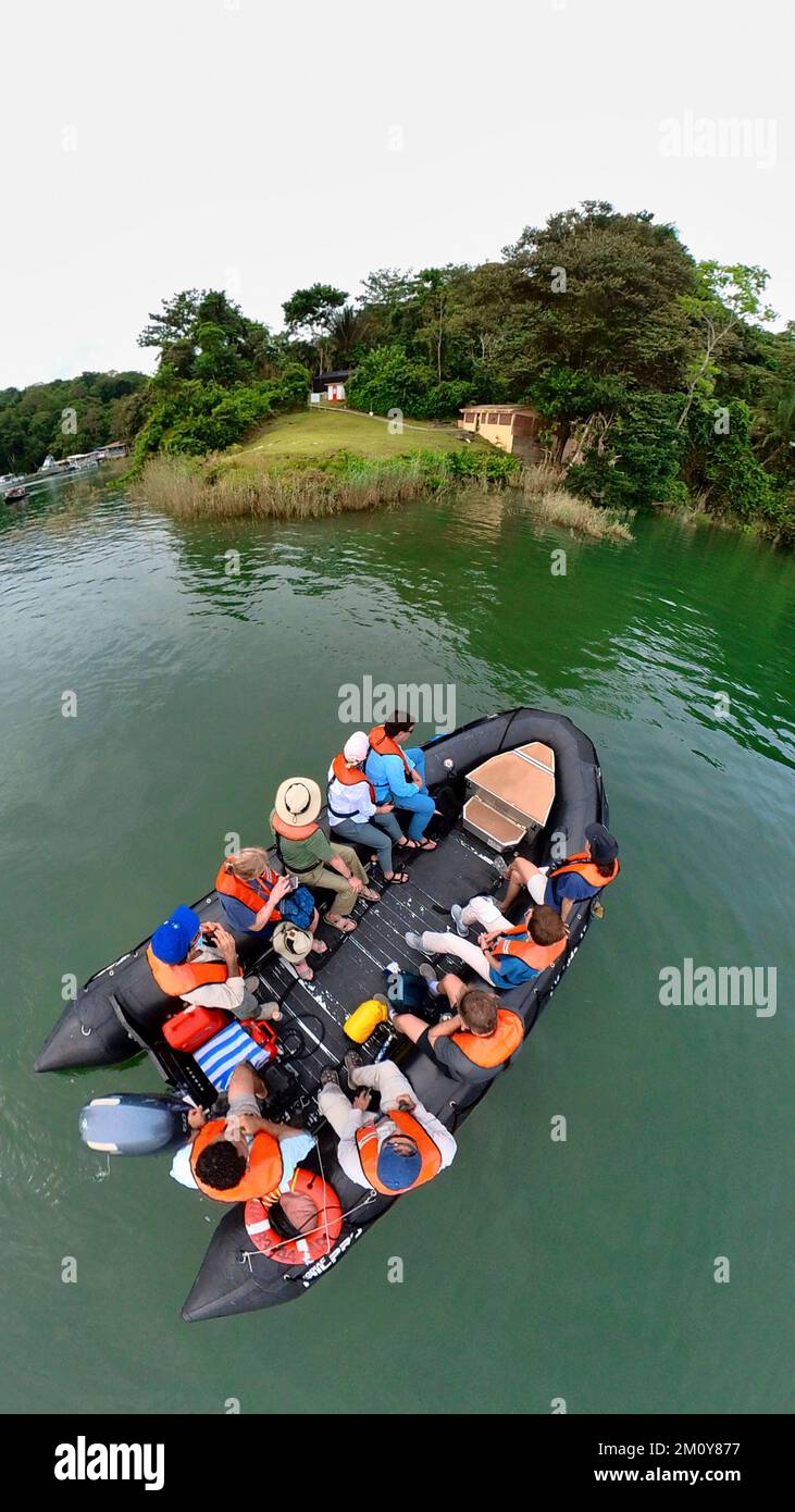 Travelers exploring Barro Colorado Island onboard of a zodiak. Located ...