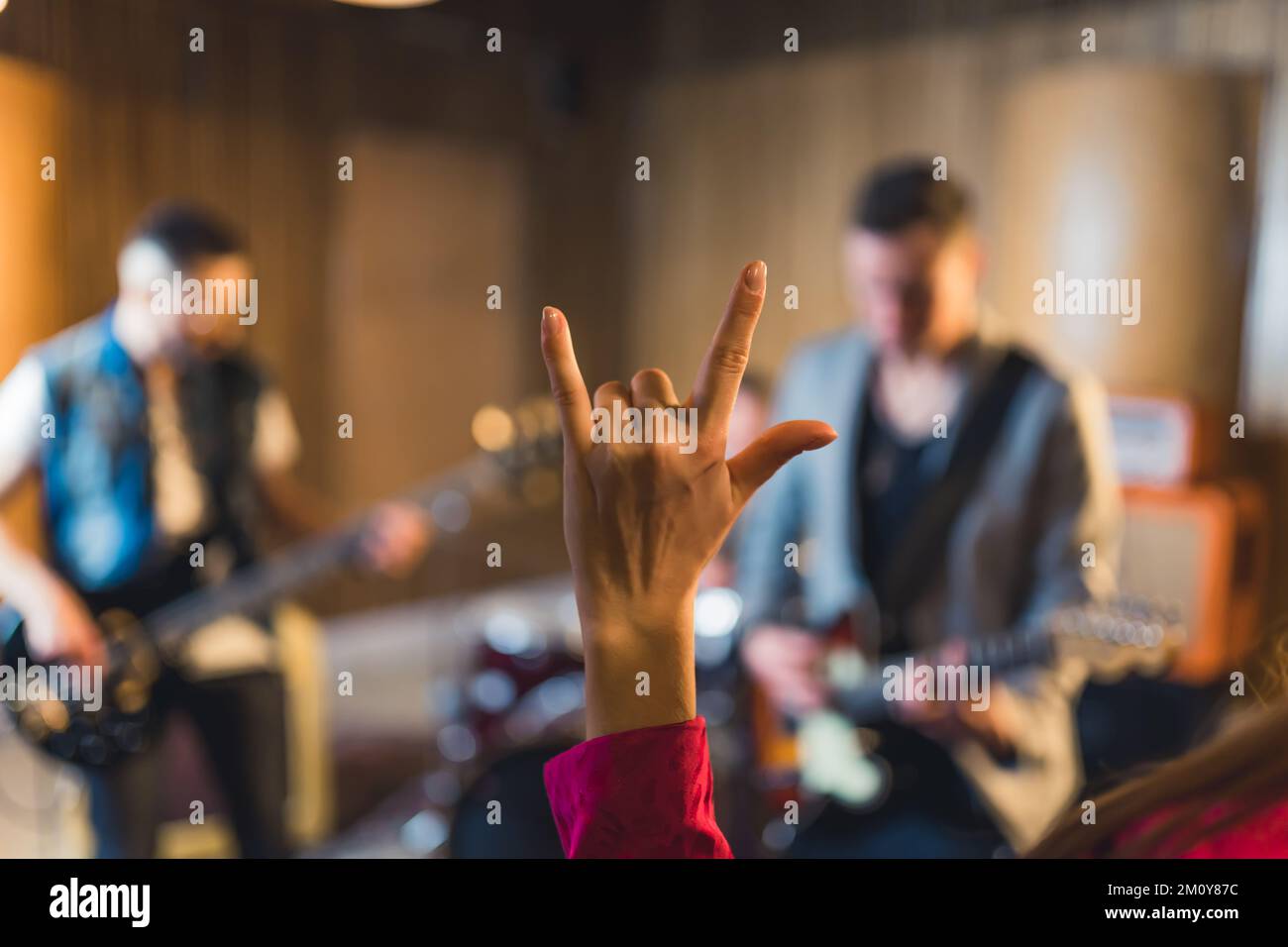 Hand raised showing a heavy metal rock sign. High quality photo Stock ...