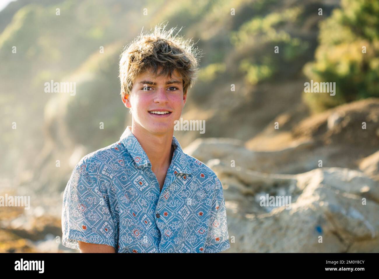 Portrait Of A California Boy At The Beach At Golden Hour Stock Photo - Alamy