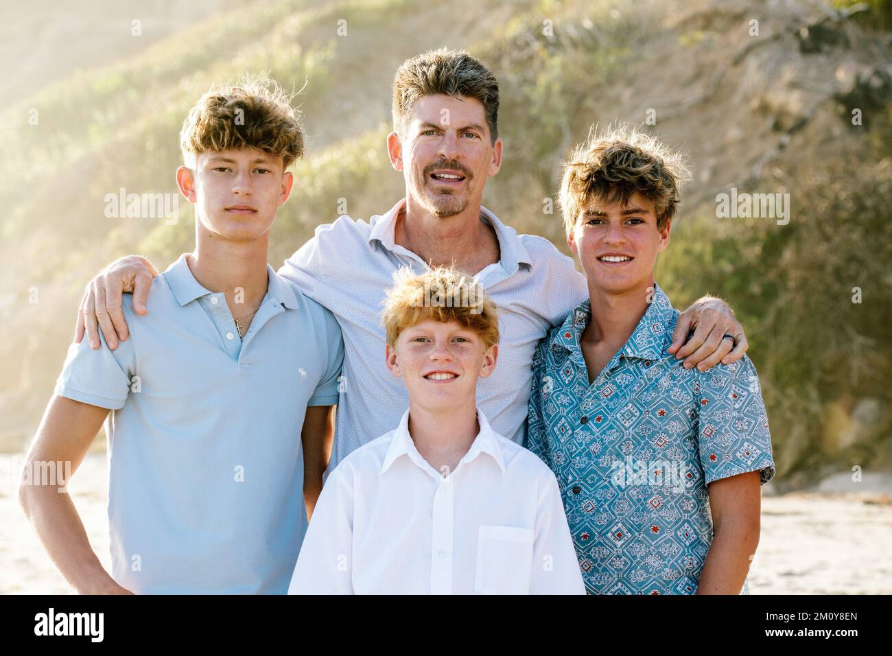 Portrait Of Father And Three Sons At The Beach Stock Photo - Alamy Portrait Of Father And Three Sons At The Beach Stock Photo - Alamy