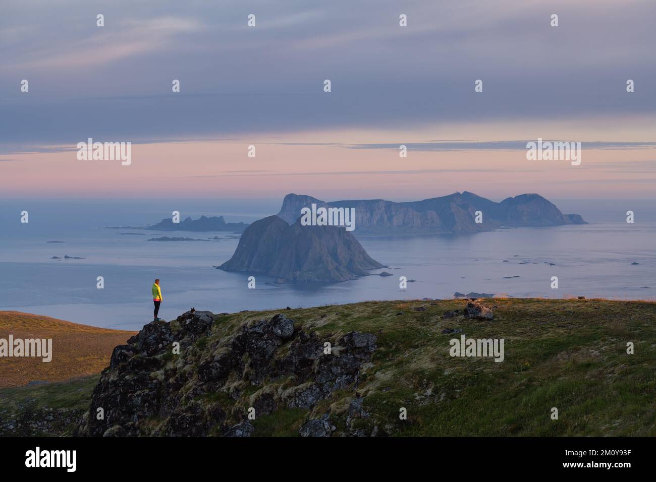 Hiker on Hellsegga plateau, Lofoten Islands, Norway Stock Photo - Alamy