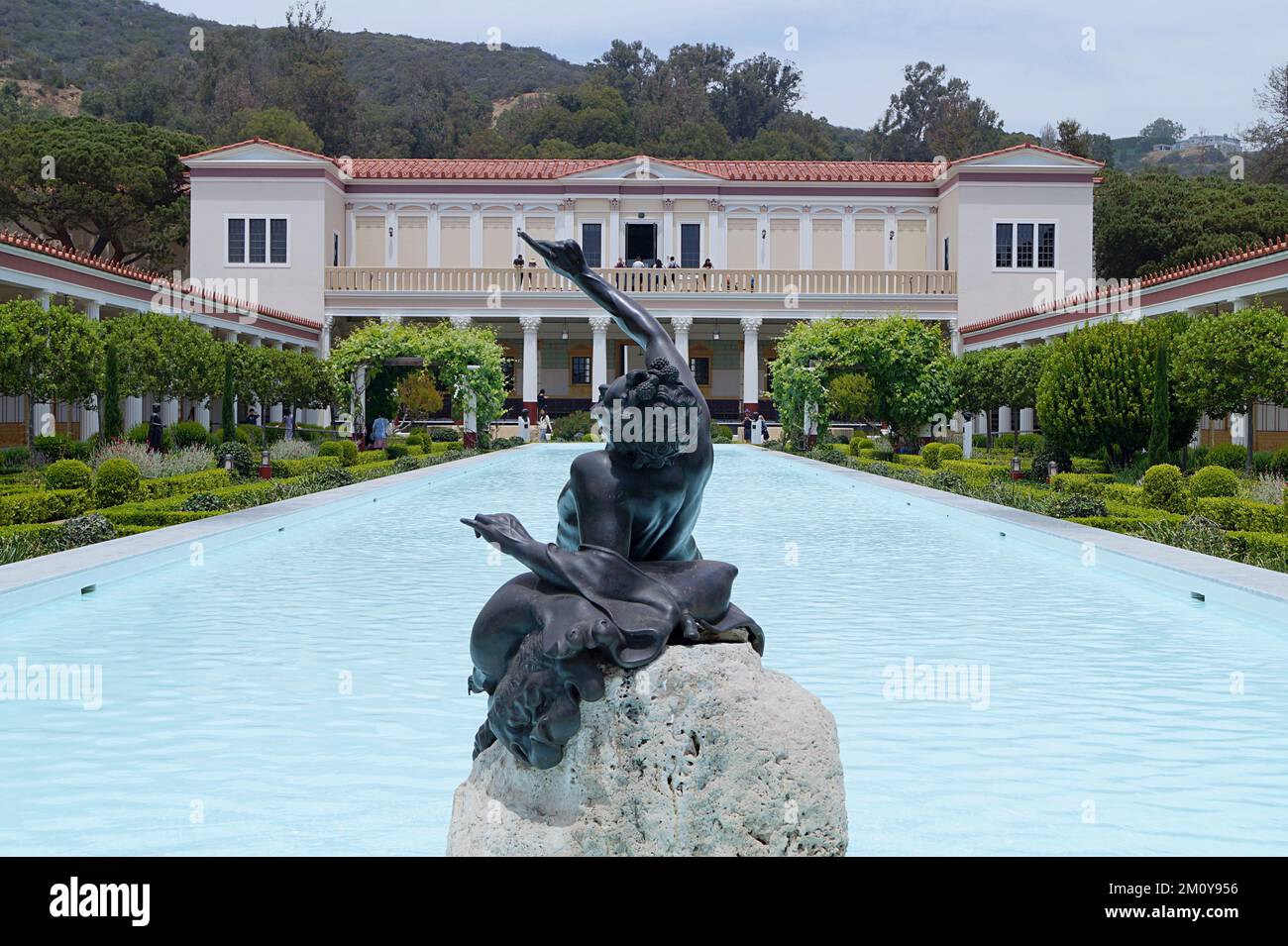 Getty Villa And Pointing Statue Stock Photo - Alamy