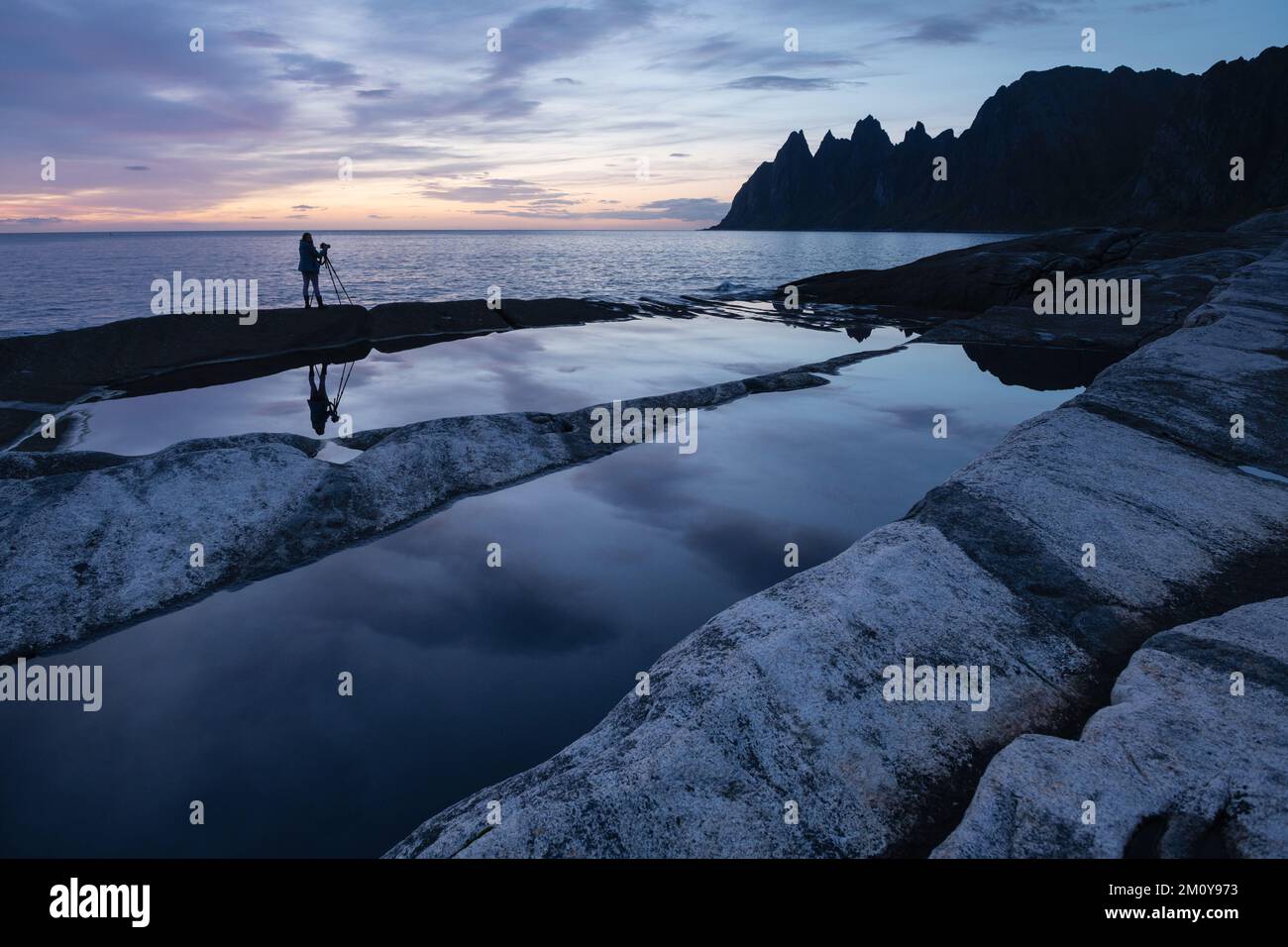 Photographer and Okshornan at Tungeneset viewpoint, Senja, Norway Stock ...