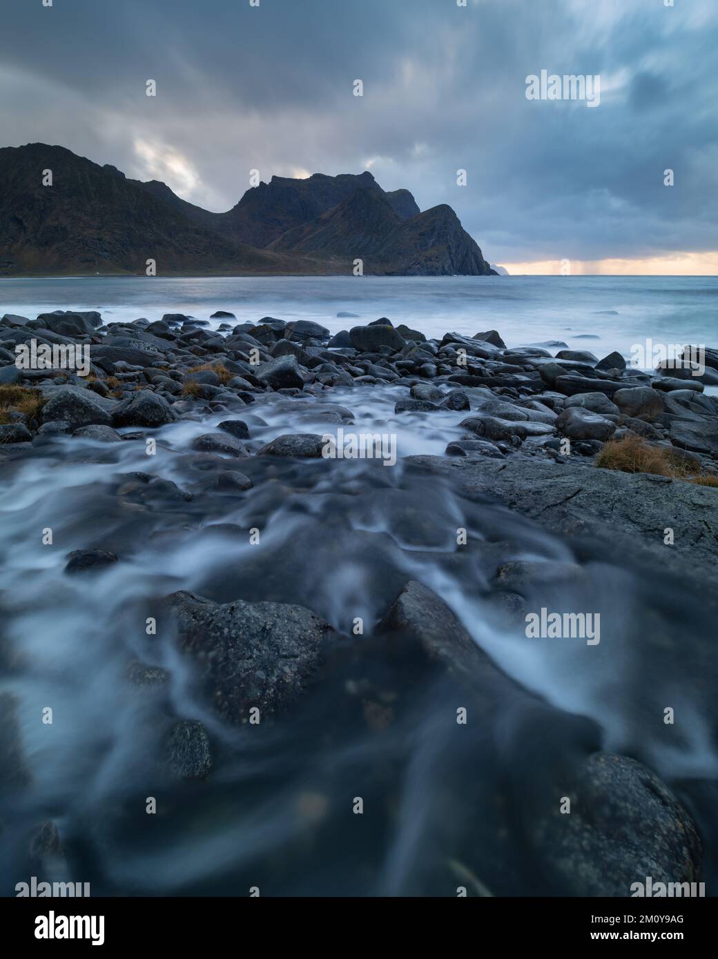 Small river flowing at Unstad beach, Lofoten Islands, Norway Stock ...