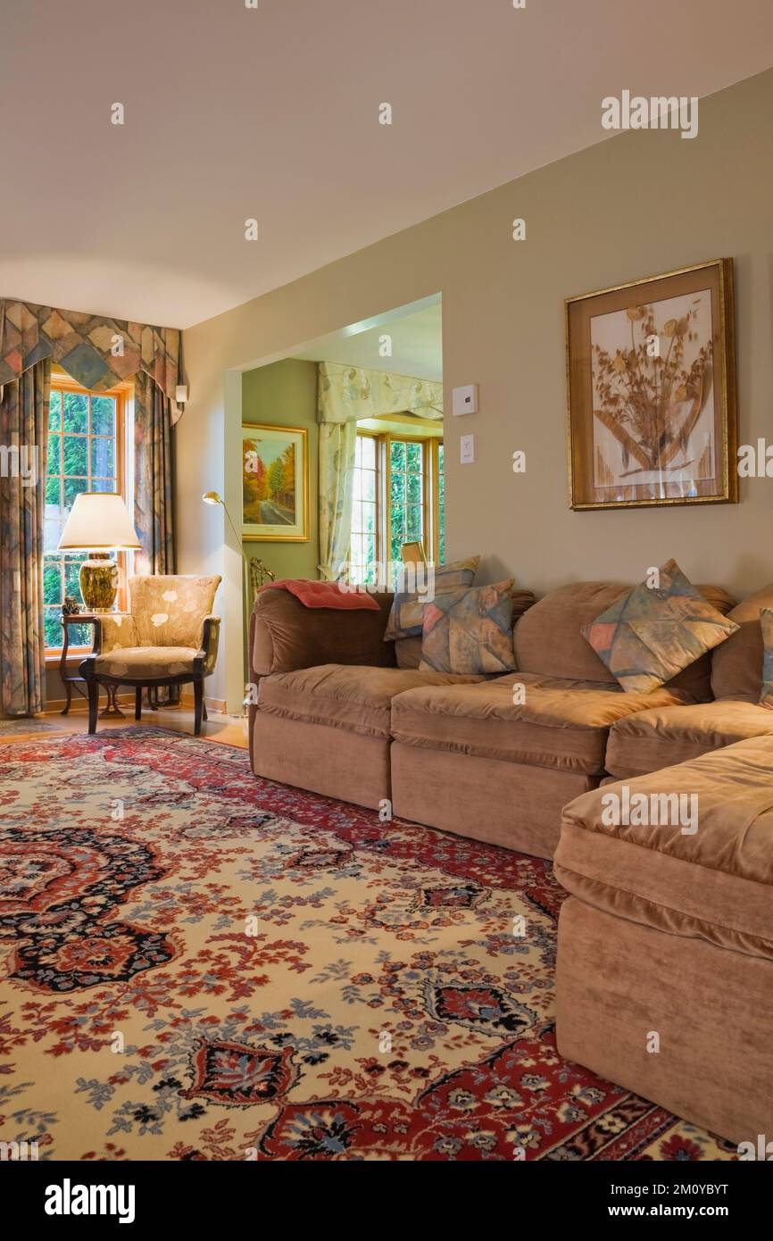 Sectional sofa and antique furnishings inside mixed decorated and ...