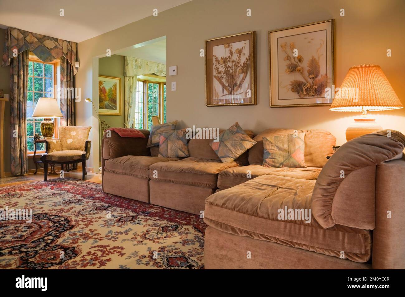 Sectional sofa and antique furnishings inside mixed decorated and ...