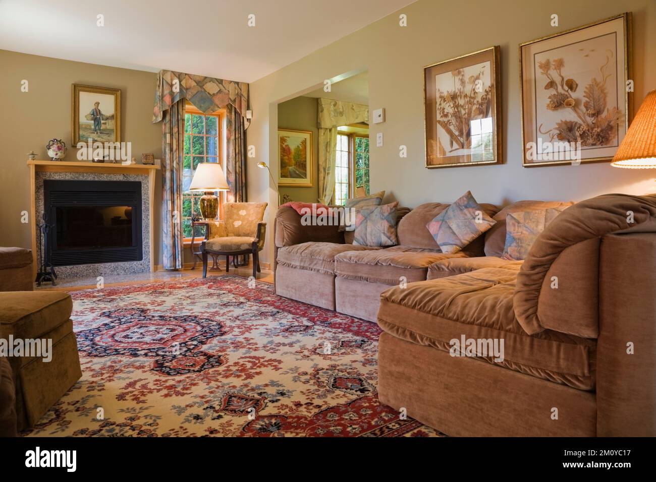 Sectional sofa and antique furnishings inside mixed decorated and ...