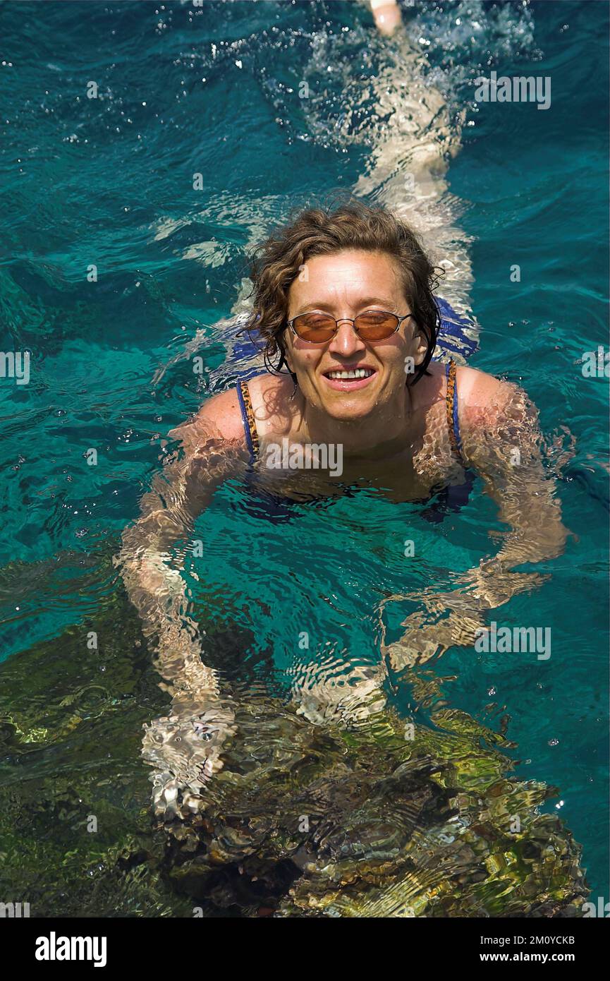 Hydra, Idra, Ύδρα, Grecja, Greece, Griechenland; A woman with glasses ...