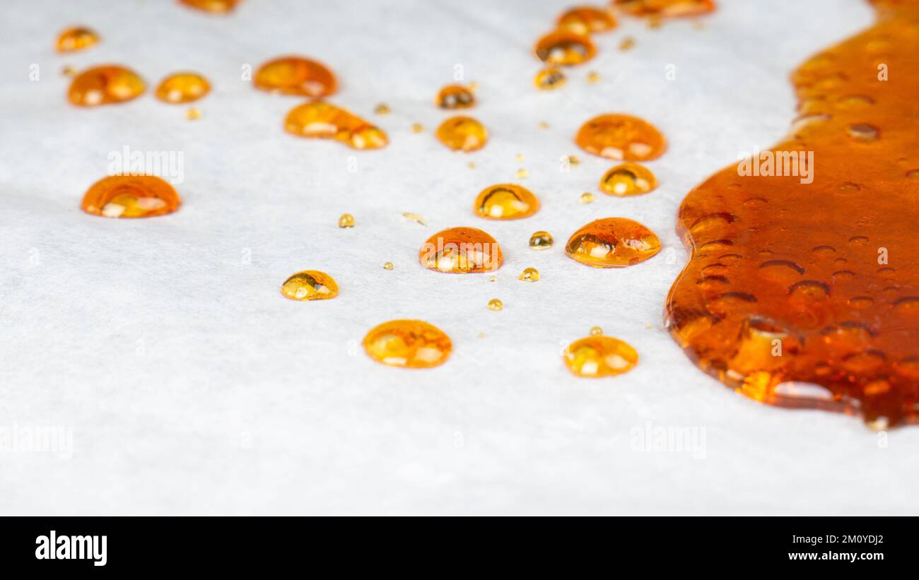 amber cannabis resin macro marijuana extract dab with high thc Stock ...