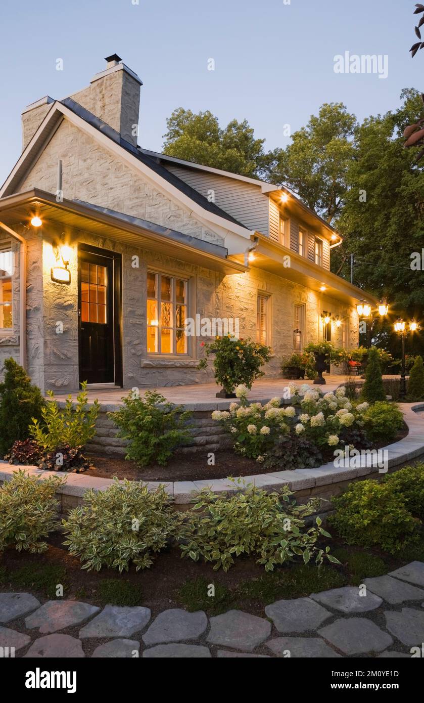 Old 1840 greyish cement and stone cladded two story Canadian cottage ...
