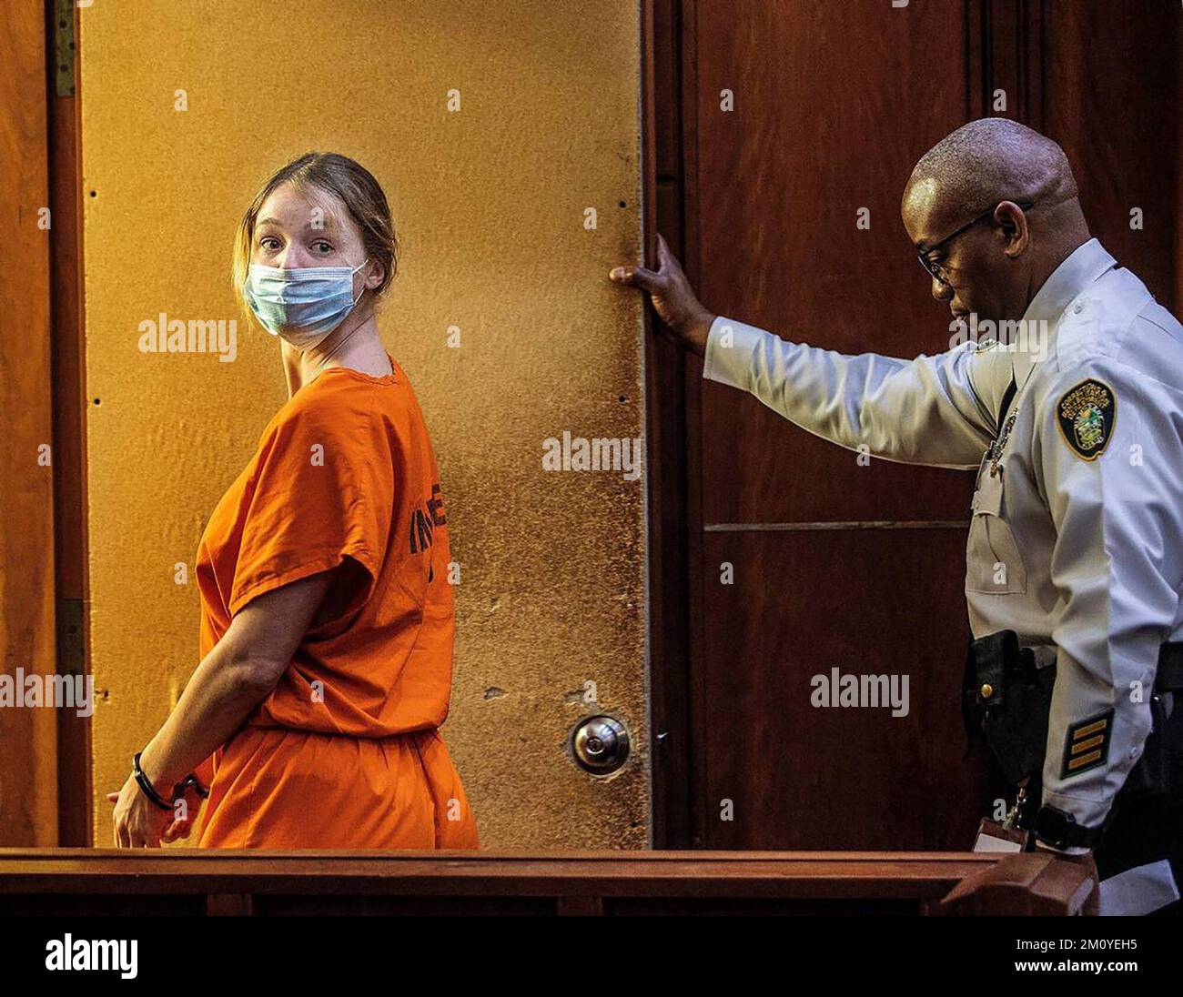 Courtney Clenney is being taken away, during an evidentiary hearing on ...