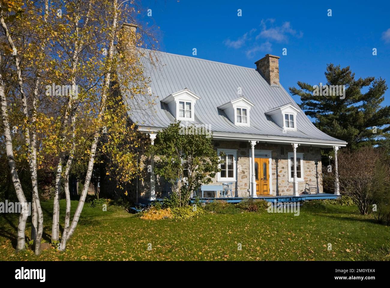 Old 1746 Canadiana cottage style fieldstone home with blue and white ...