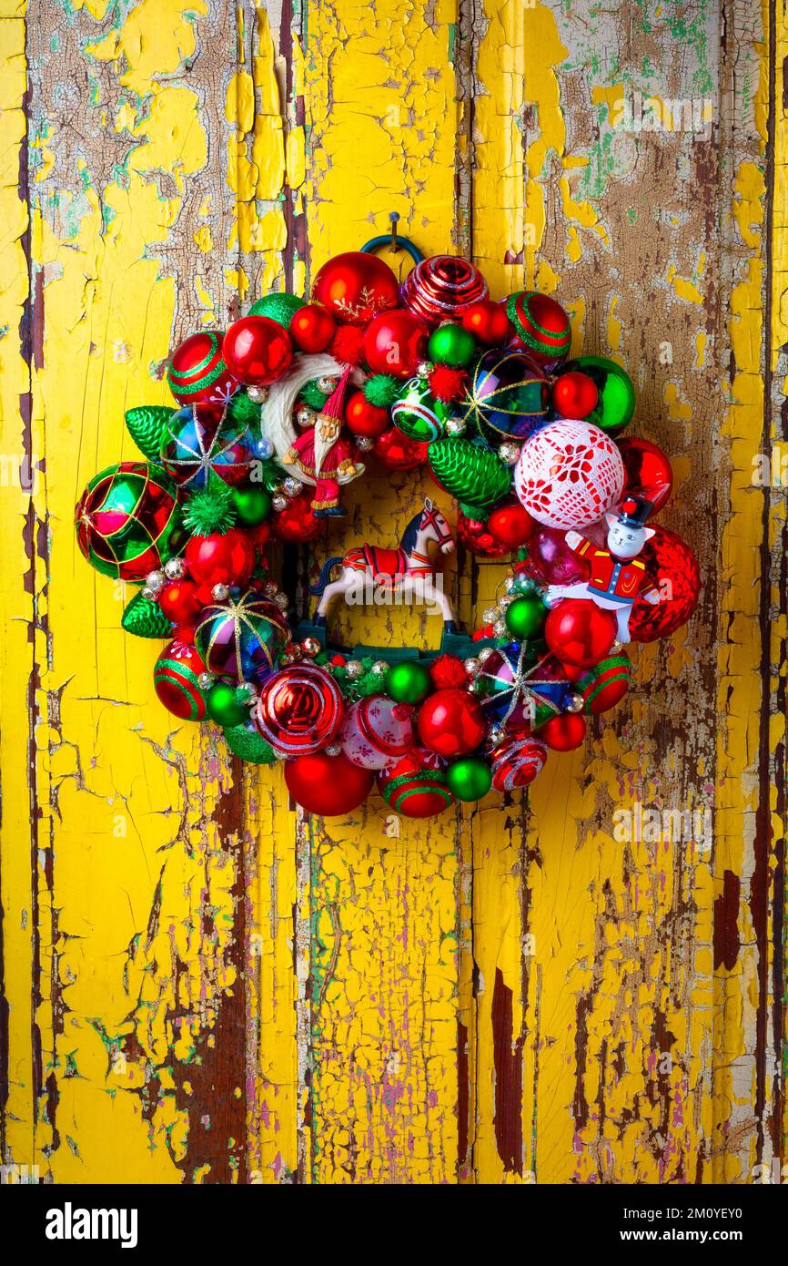 Vintage Christmas Wreath On Old Weathered Yellow Door Still Life Stock ...