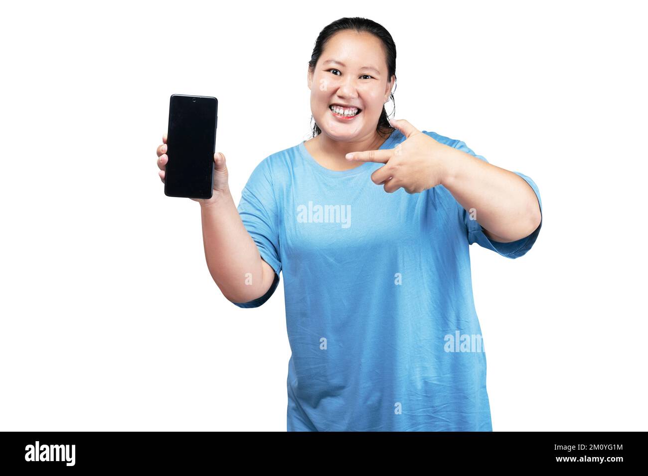 Asian fat overweight woman holding a mobile phone and showing an empty ...