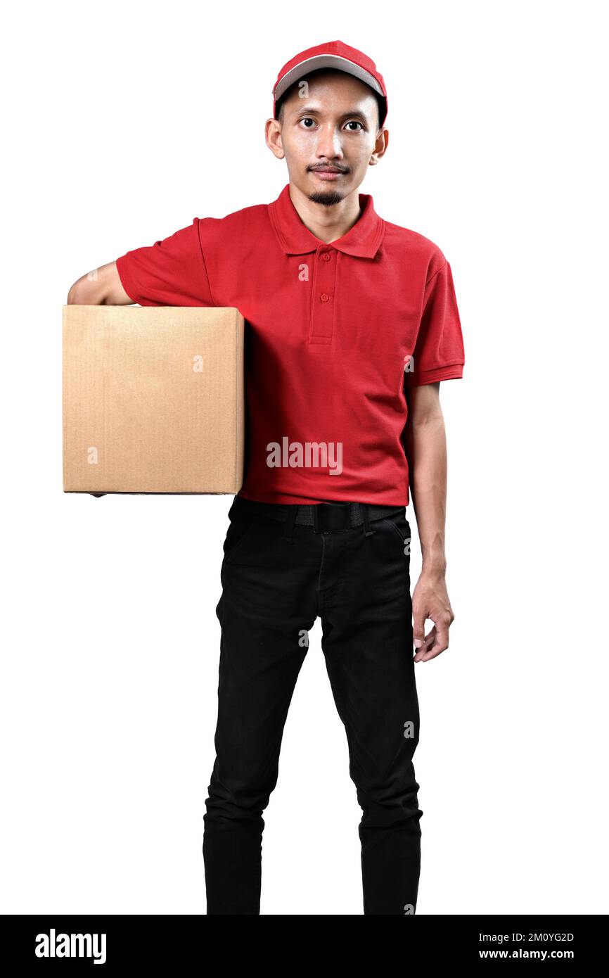 Parcel delivery man with a hat carrying a package isolated over white ...