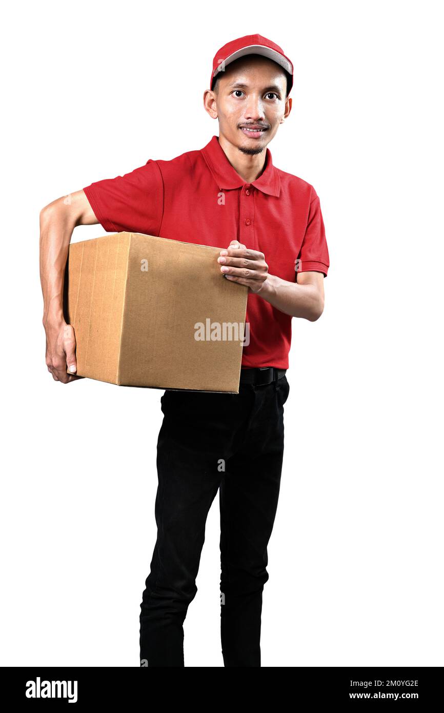 Parcel delivery man with a hat carrying a package isolated over white ...