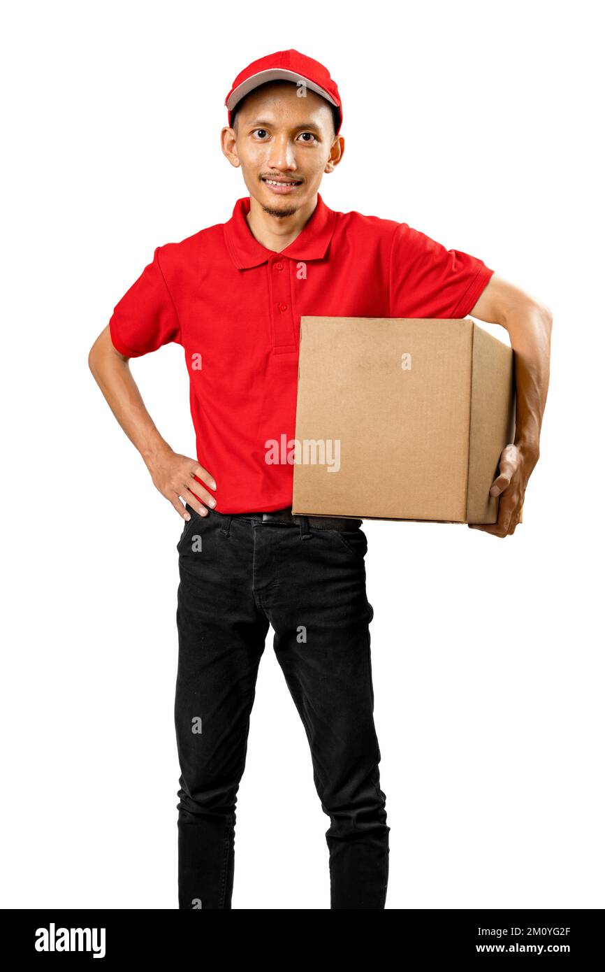 Parcel delivery man with a hat carrying a package isolated over white ...