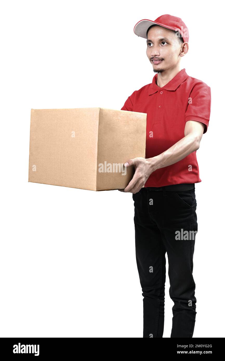 Parcel delivery man with a hat carrying a package isolated over white ...