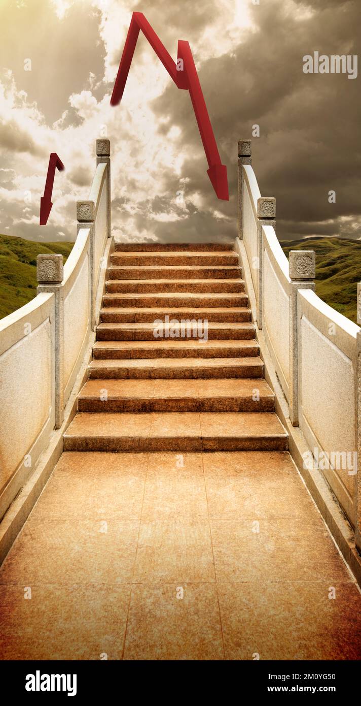 Decreased arrow on the sky with dark cloud background Stock Photo - Alamy