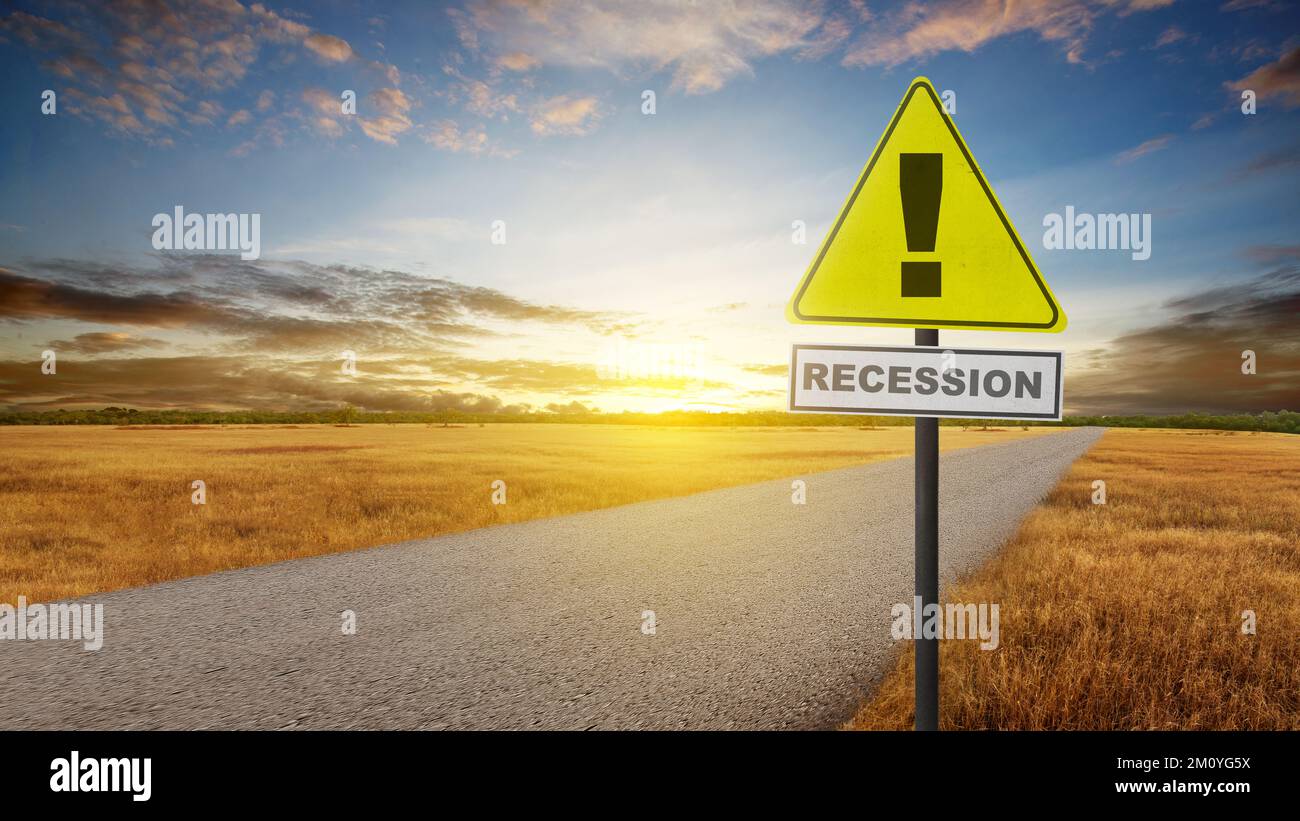 Street with recession sign with sunset sky background Stock Photo - Alamy