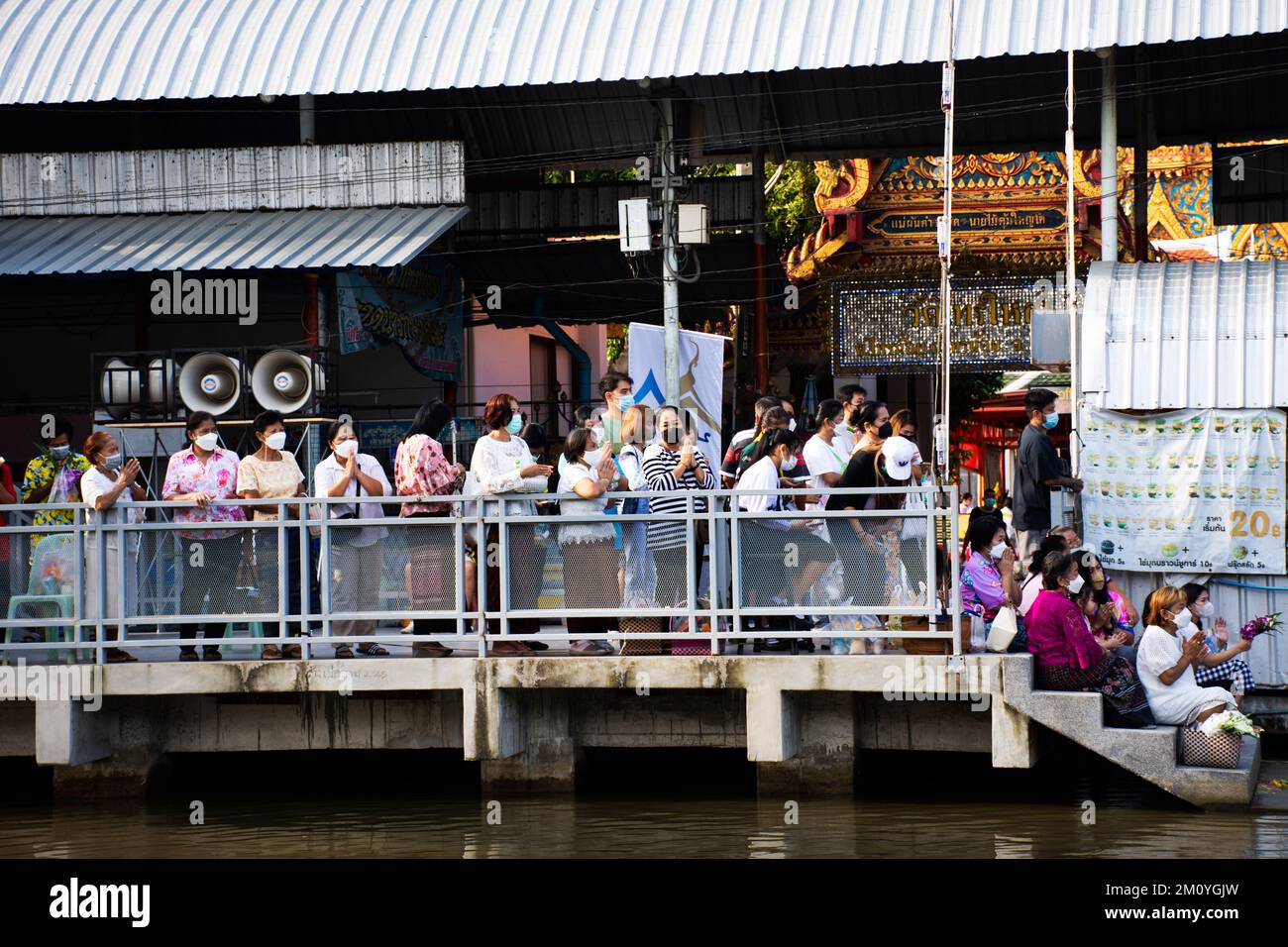 Thai people foreign traveler travel visit and join tradition merit ...