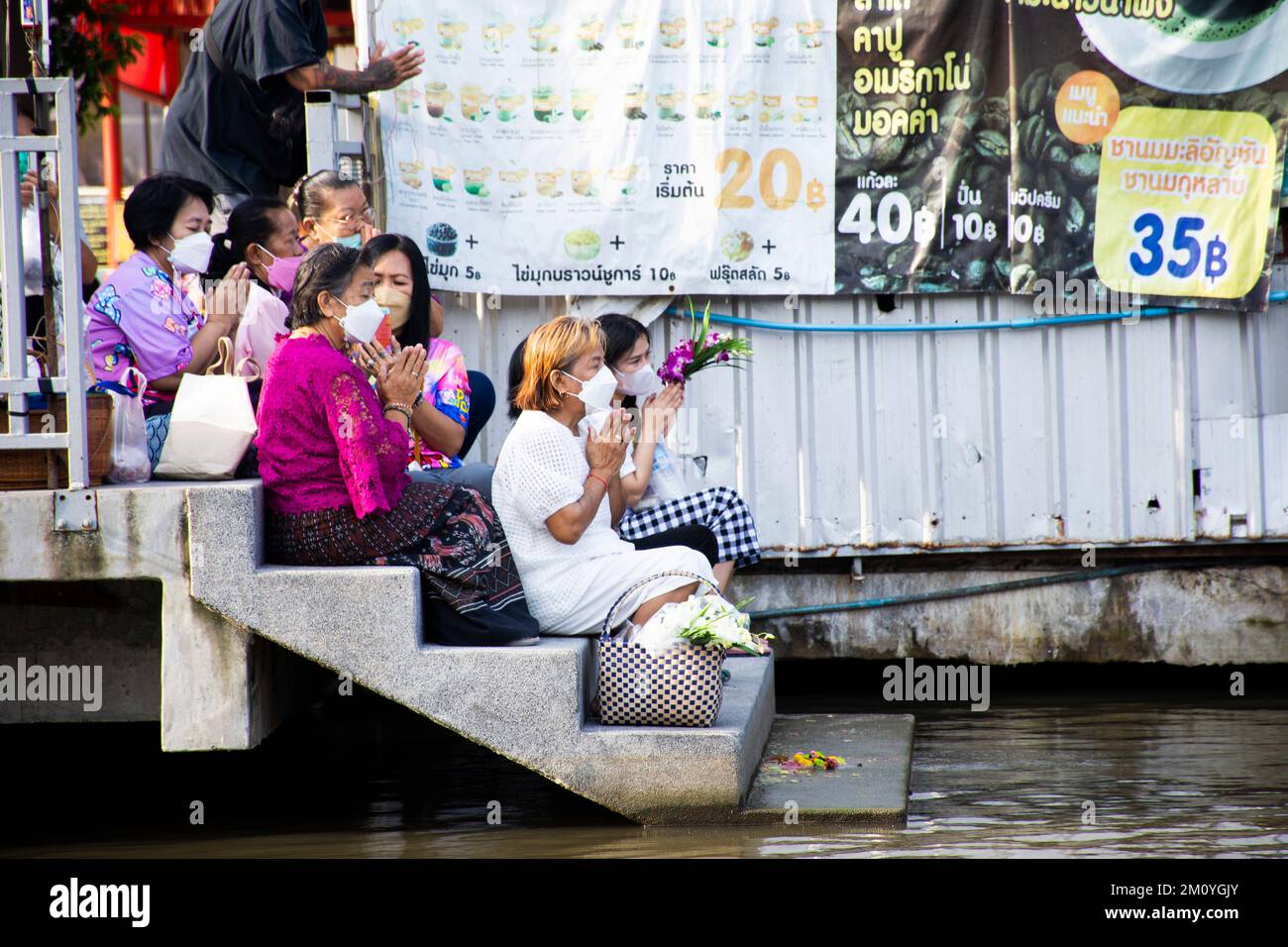 Thai people foreign traveler travel visit and join tradition merit ...