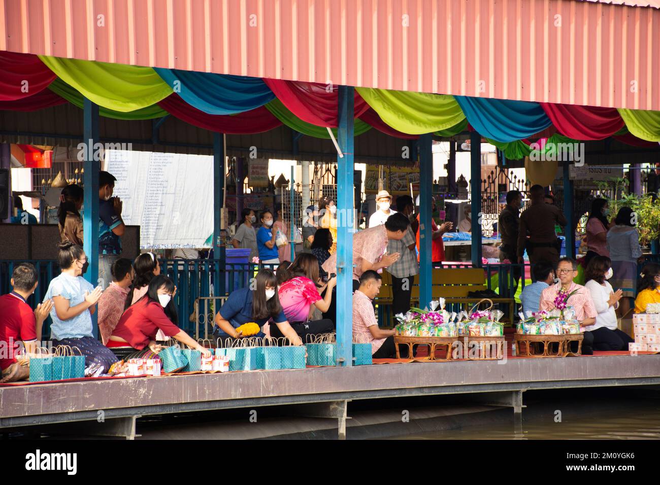 Thai people foreign traveler travel visit and join tradition merit ...