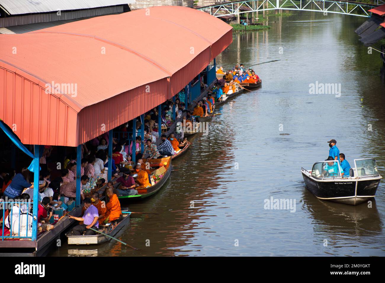 Thai people foreign traveler travel visit and join tradition merit ...