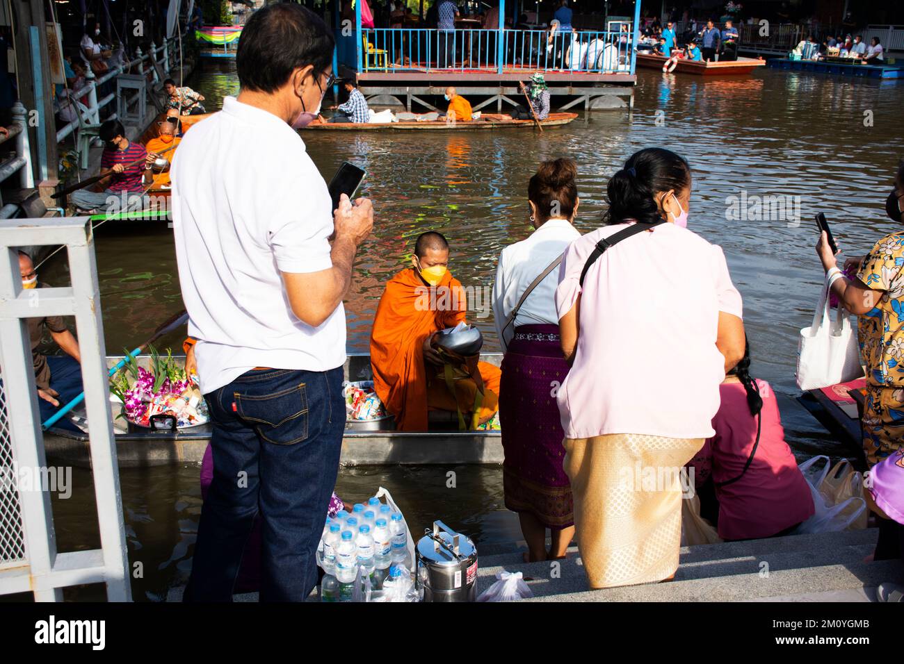 Thai people foreign traveler travel visit and join tradition merit ...