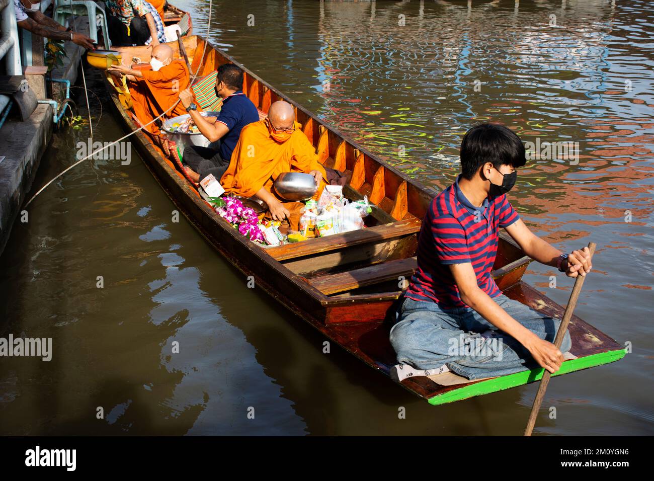 Thai people foreign traveler travel visit and join tradition merit ...