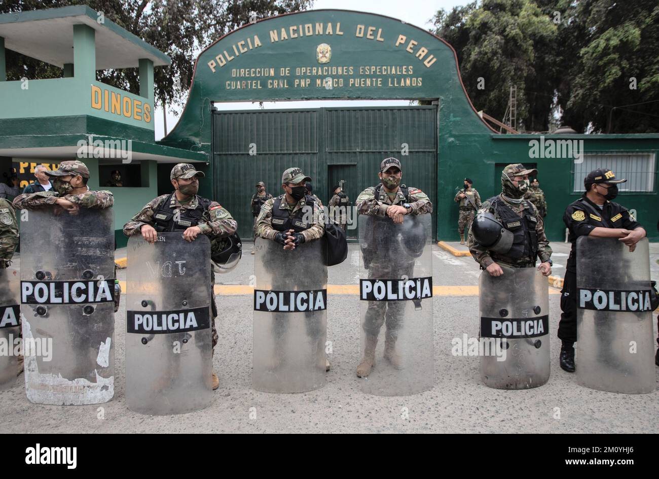 Lima, Peru. 08th Dec, 2022. Police officers stand guard outside the ...