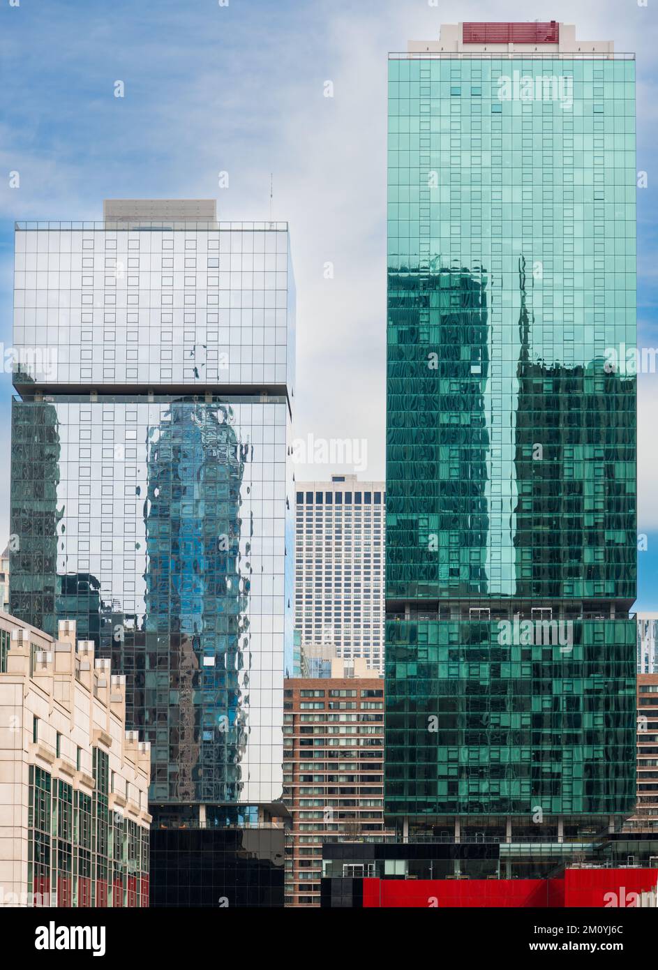 Vertical view of modern glass and steel skyscrapers in a dense downtown ...