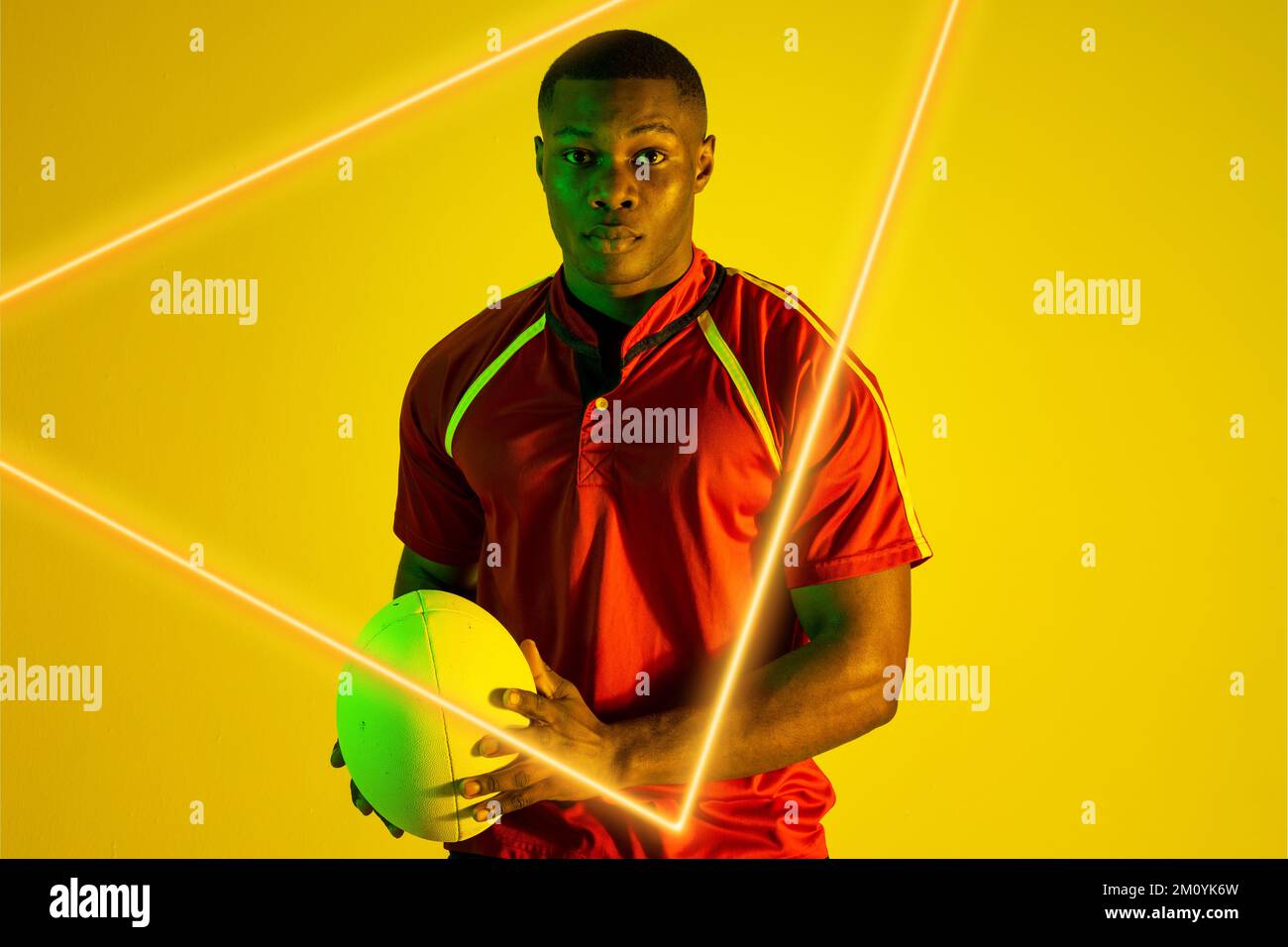 Triangle neon over confident african american young rugby player ...