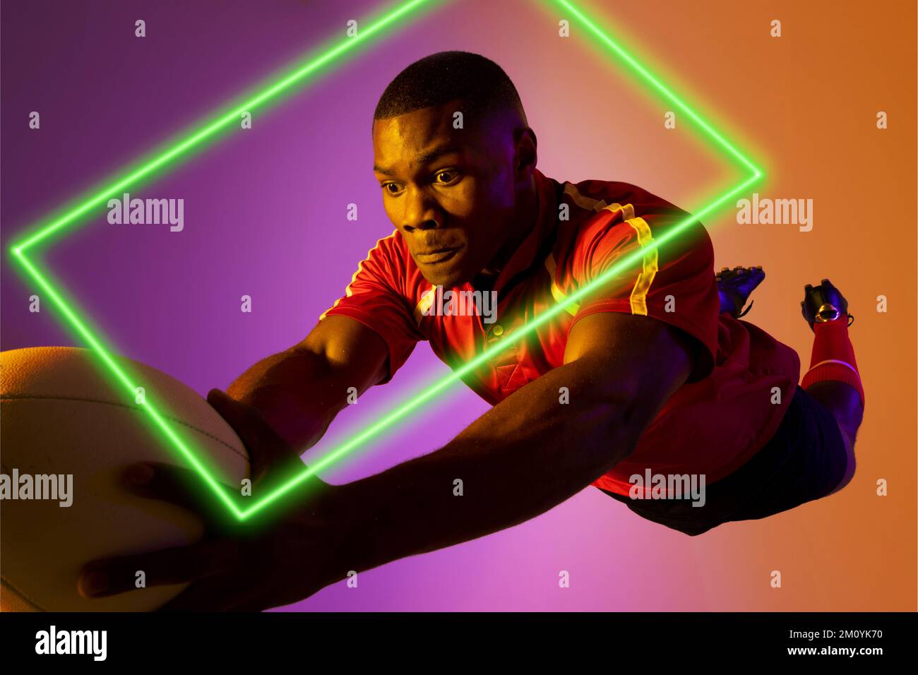 Rectangle neon over african american young rugby player jumping against ...