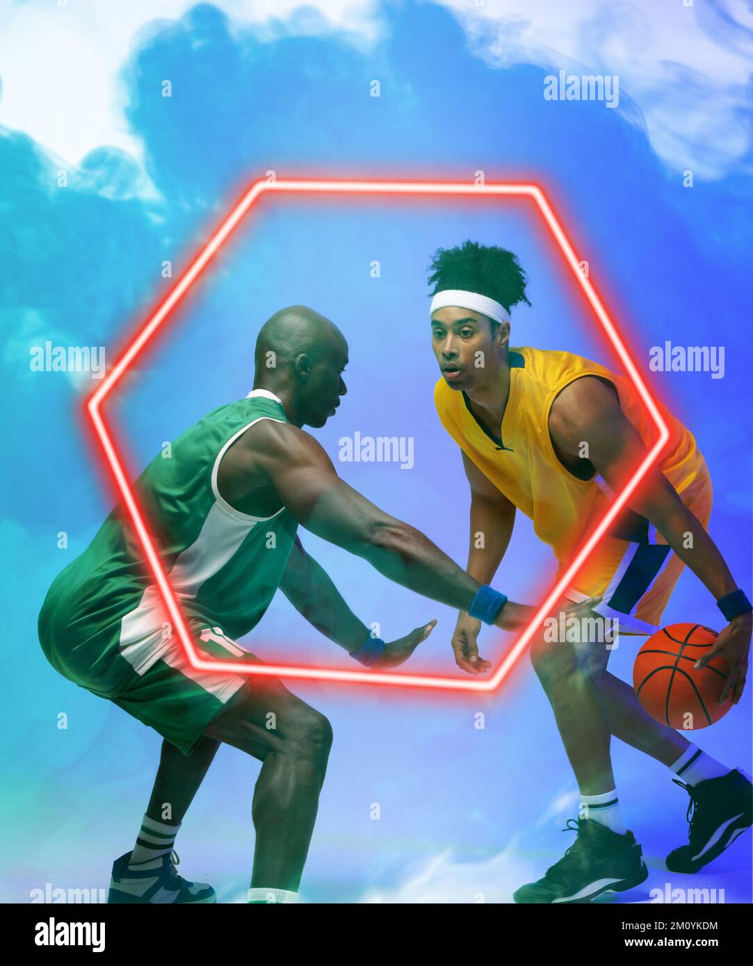 African american basketball male players dribbling ball by illuminated ...