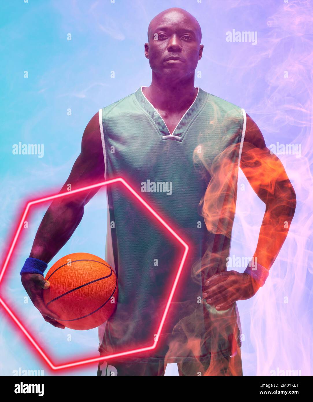 Portrait of bald african american basketball player with ball standing ...