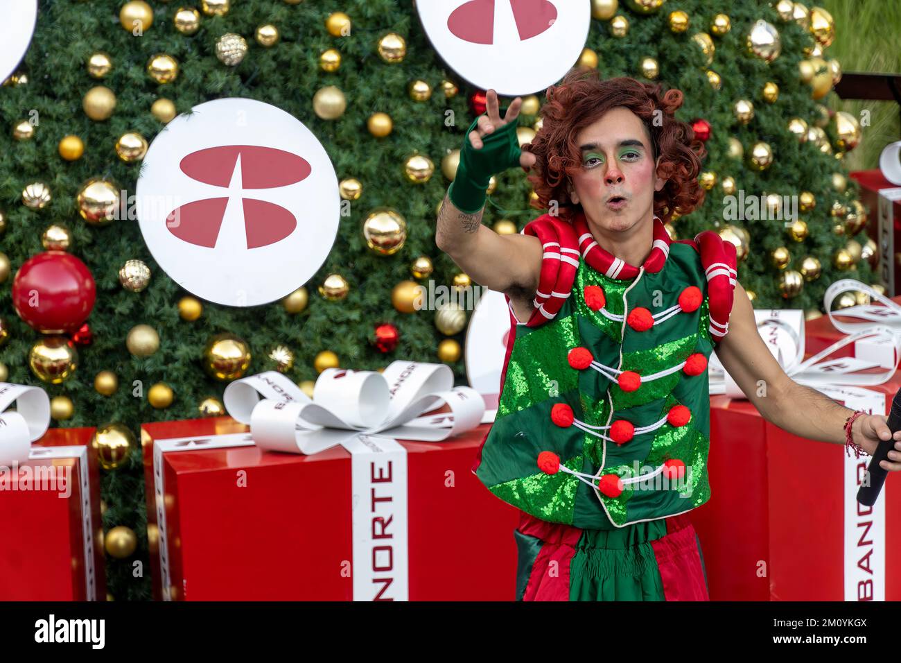 santa helpers carrying wrapped gifts mexico latin america Stock Photo ...
