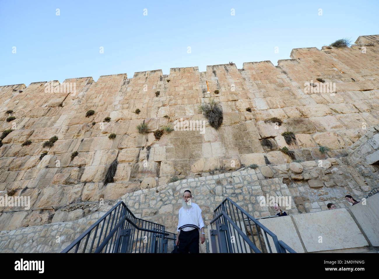 A Jewish Orthodox man walking in the archeological park in the old city ...