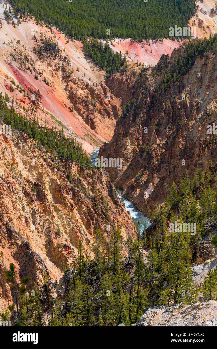 River flowing through steep, colorful cliffs of the Grand Canyon of the ...