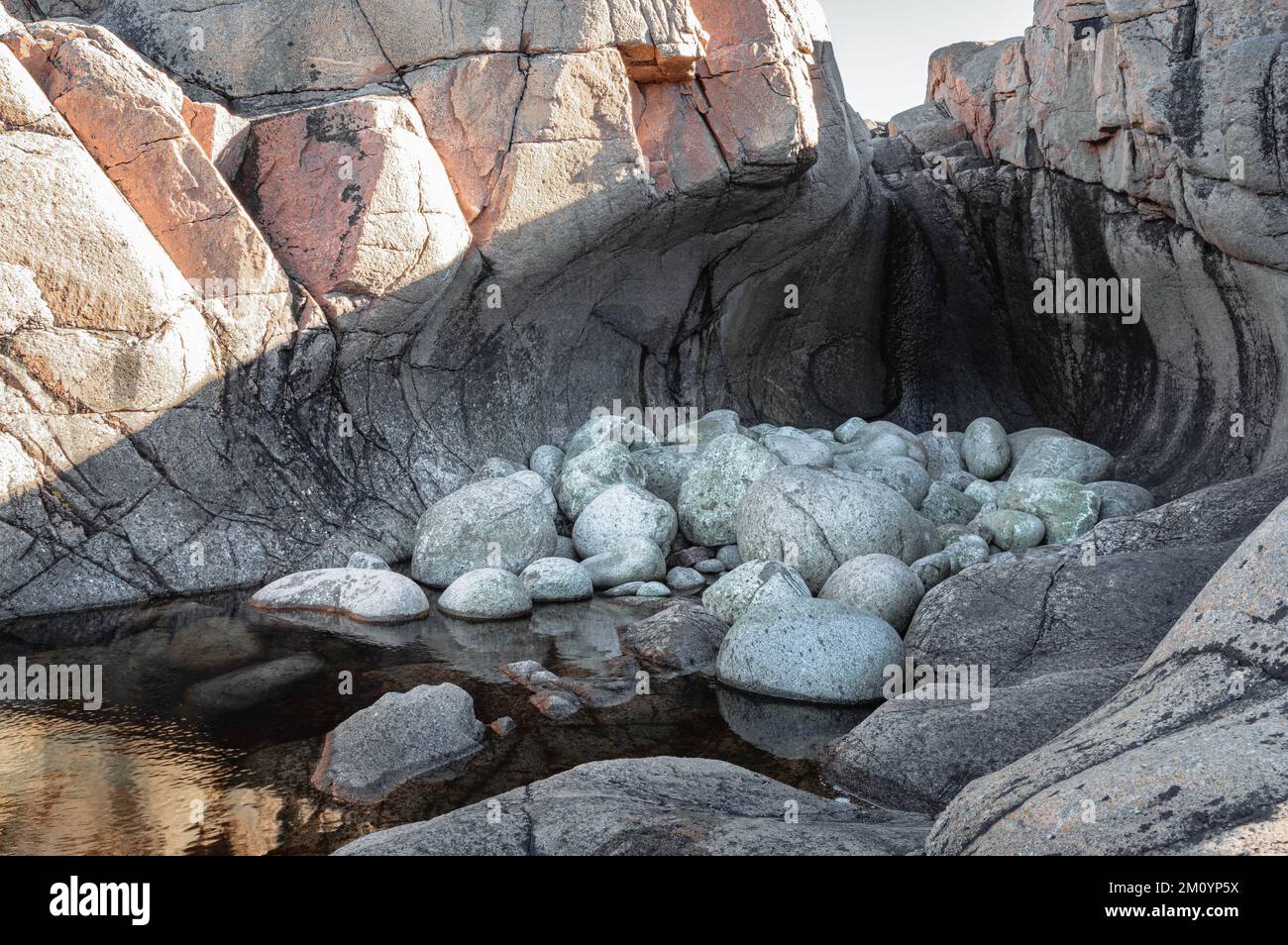 Ancient ritual cave within the rocks of Teriberka, Russia Stock Photo ...