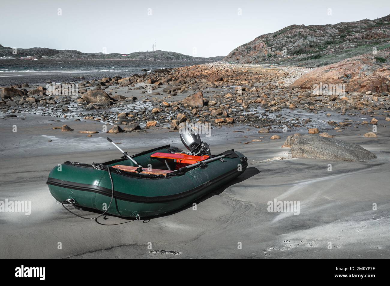 Abandoned fishing boat on a desolate shore of Teriberka, Russia Stock ...