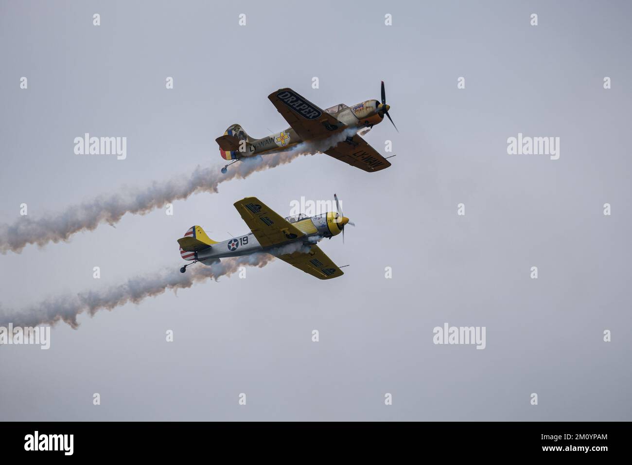 A view of airplanes flying in sky during airshow Stock Photo - Alamy